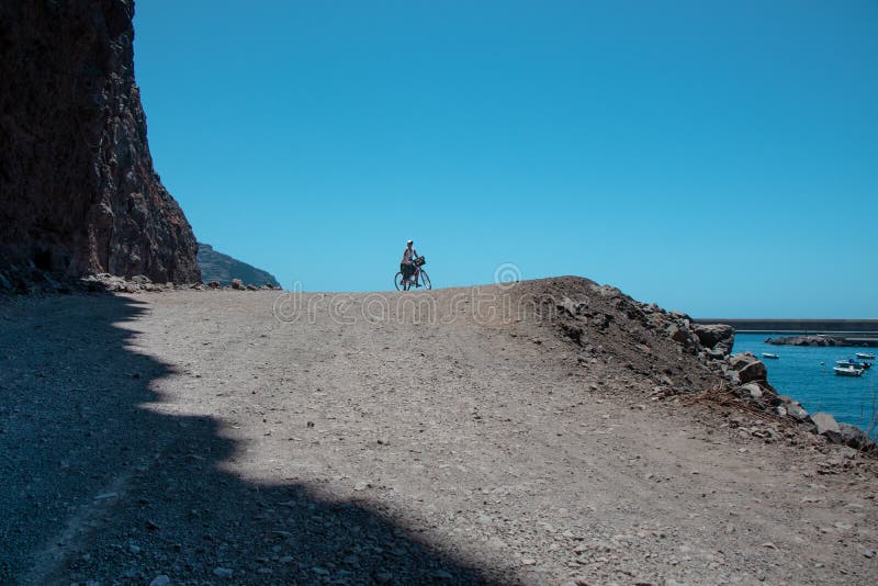 A Girl on a Bicycle on Her Way To a Rock Stock Image - Image of ...