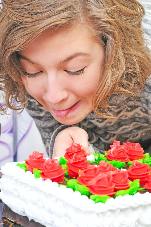 Girl with big cake stock image. Image of home, attractive - 7540397