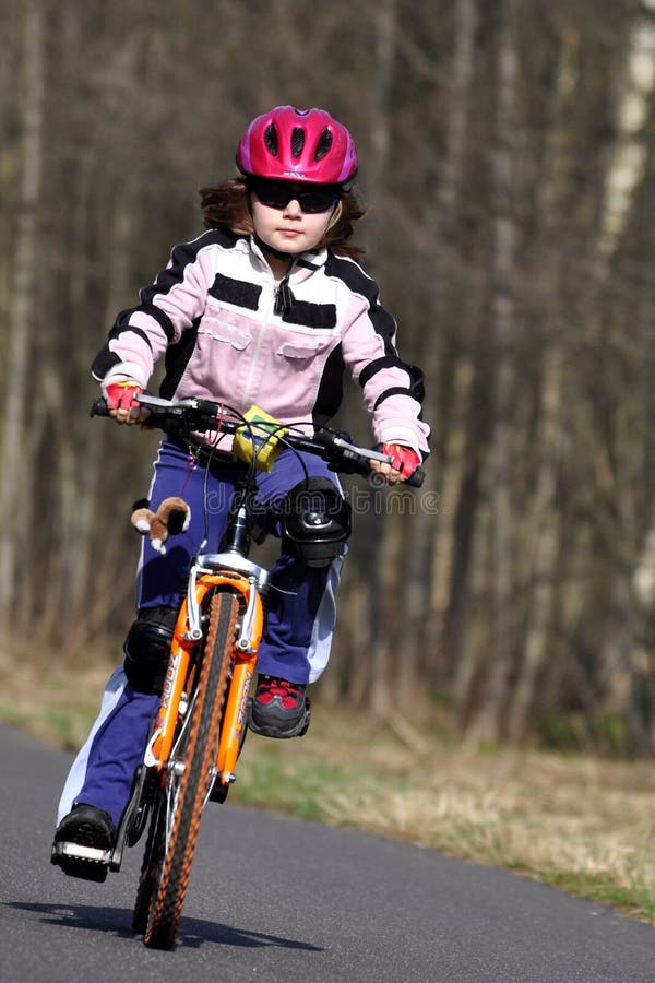 Girl on bike stock photo. Image of color, cycle, female - 19045436