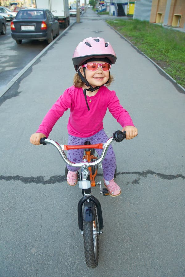 Girl on bike stock photo. Image of little, bicyclist - 20434932