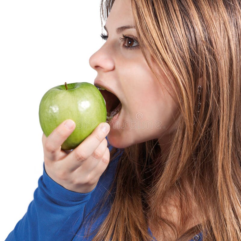Girl biting an apple stock image. Image of happy, background - 46230839