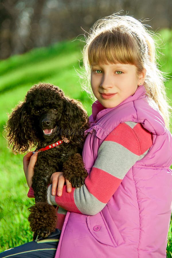 Girl With The Black Poodle On Nature Stock Photo - Image of beautiful ...