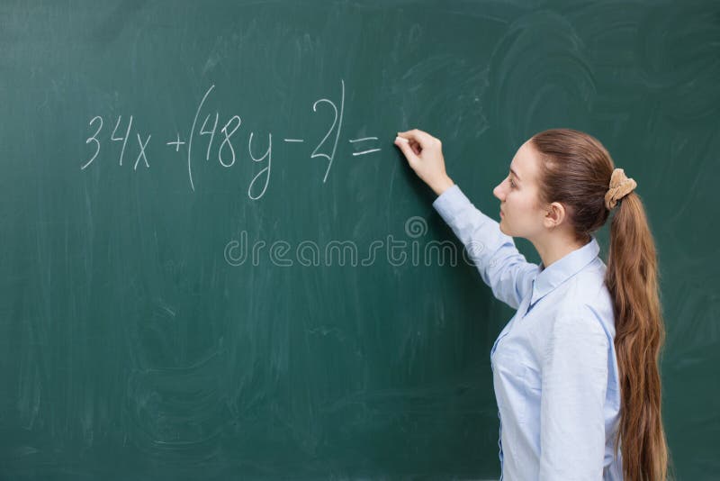 Girl at the Blackboard in a Mathematics Class Stock Photo - Image of ...