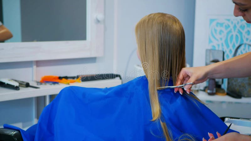 Girl Blonde Having Haircut At The Salon Haircut For Long Hair Under Square Stock Footage
