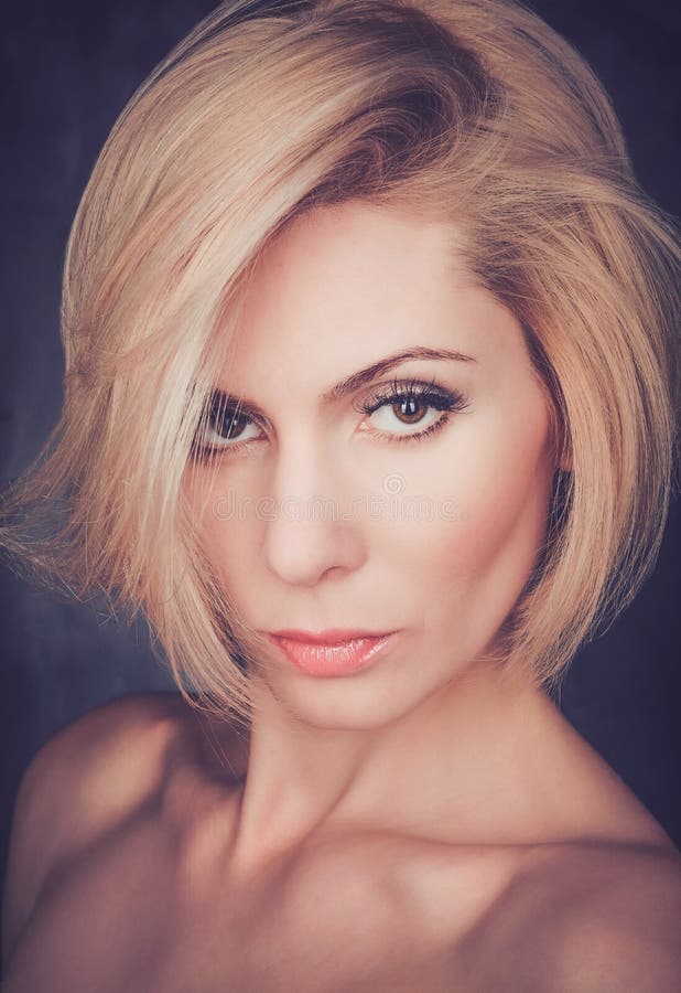 The Girl Blonde Portrait in a Studio Emotions Stock Photo - Image of ...