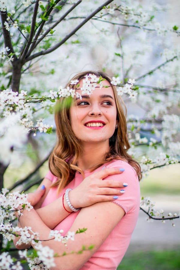 Girl in Blooming White Trees Stock Image - Image of flowering, look ...