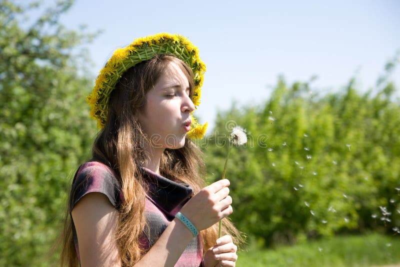 Girl blowing a dandelion stock photo. Image of lips, nature - 10769744