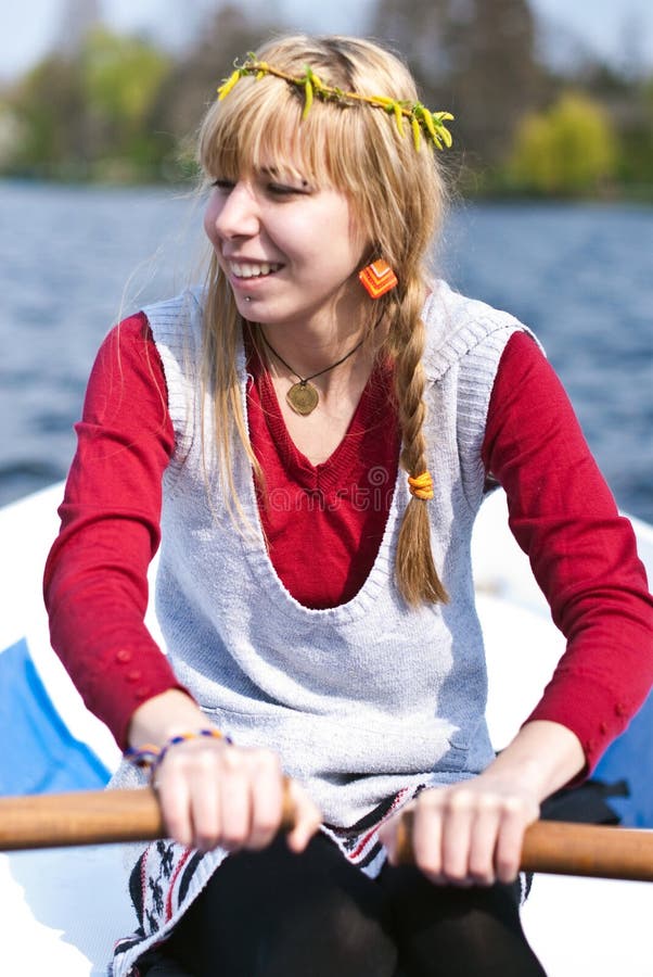 Girl in a boat rowing stock photo. Image of beautiful - 13784654