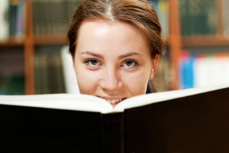 Girl with book stock photo. Image of childhood, library - 25512376