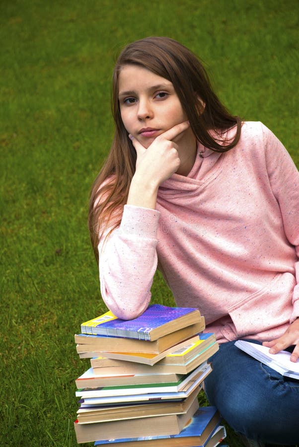 Girl with books stock photo. Image of novel, meadow, call - 55002820