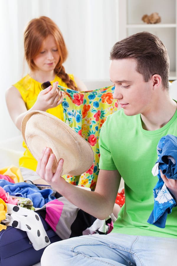 Girl and Boy Choosing Clothes Stock Photo - Image of choice, leisure ...