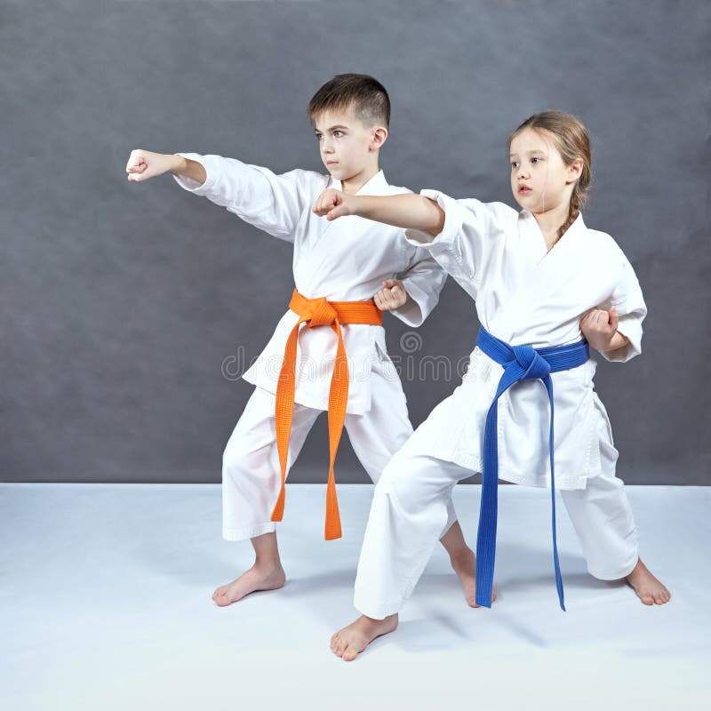Girl and Boy in Karategi Hit with a Hand Stock Photo - Image of little ...