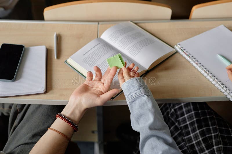 Girl and Boy Passing Cheat Sheet in Class Stock Image - Image of ...