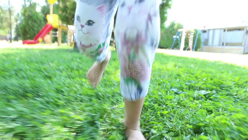 Girl and Boy Running Barefoot on the Grass Stock Video - Video of ...