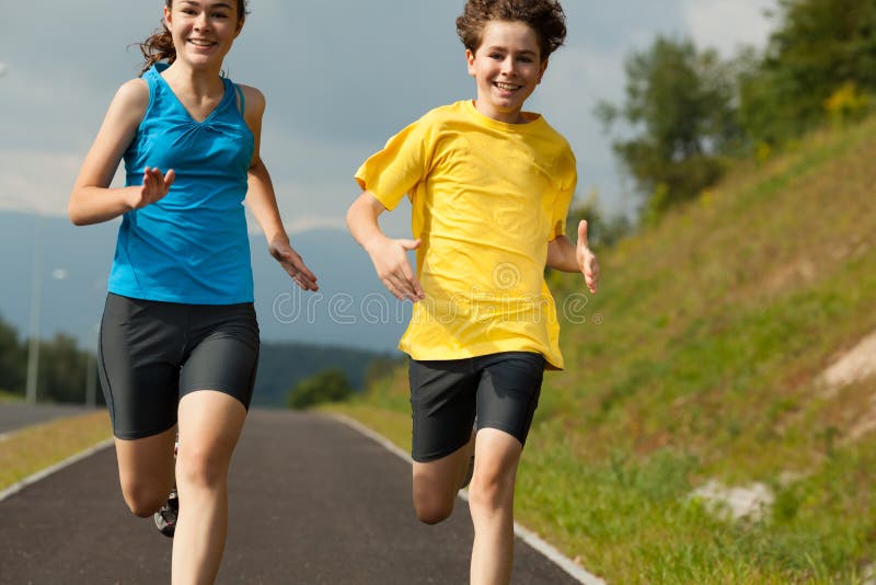 Kids Running, Jumping Outdoor Stock Photo - Image of jump, friends ...