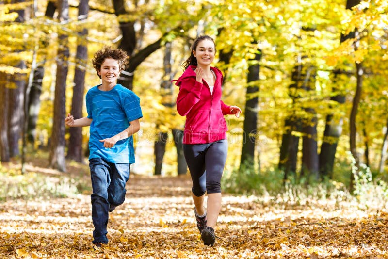Girl and Boy Running, Jumping in Park Stock Image - Image of boys ...