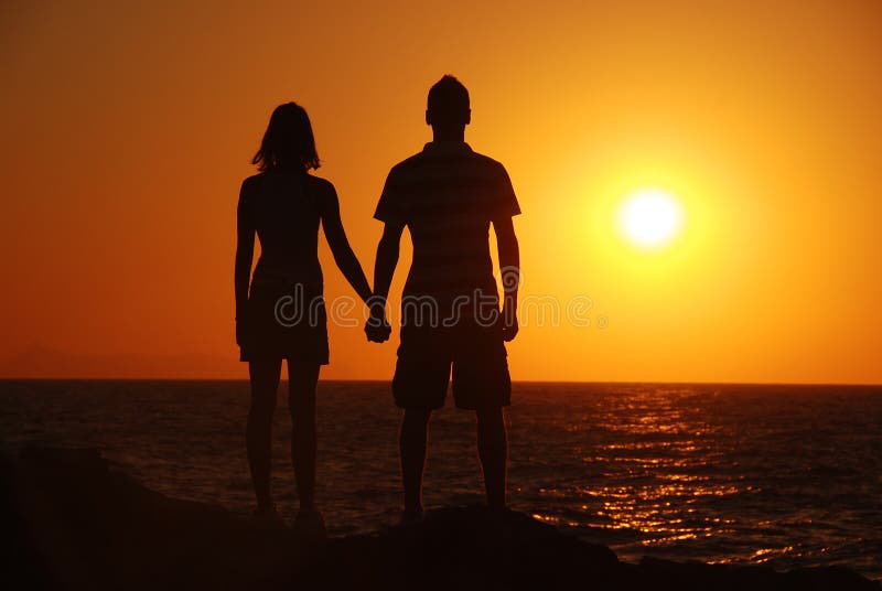 Girl,boy,sea and sunset stock image. Image of sunset, couple - 8448623