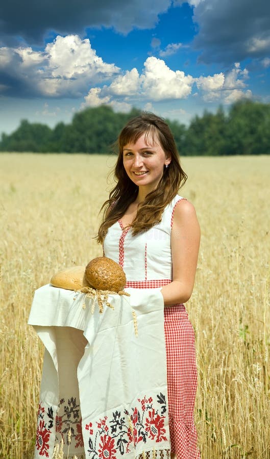 Girl with bread at field stock image. Image of agriculture - 15377059