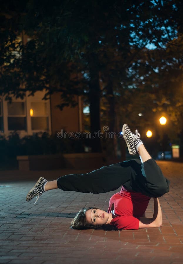 Girl breakdancing at night stock photo. Image of adult - 28059924