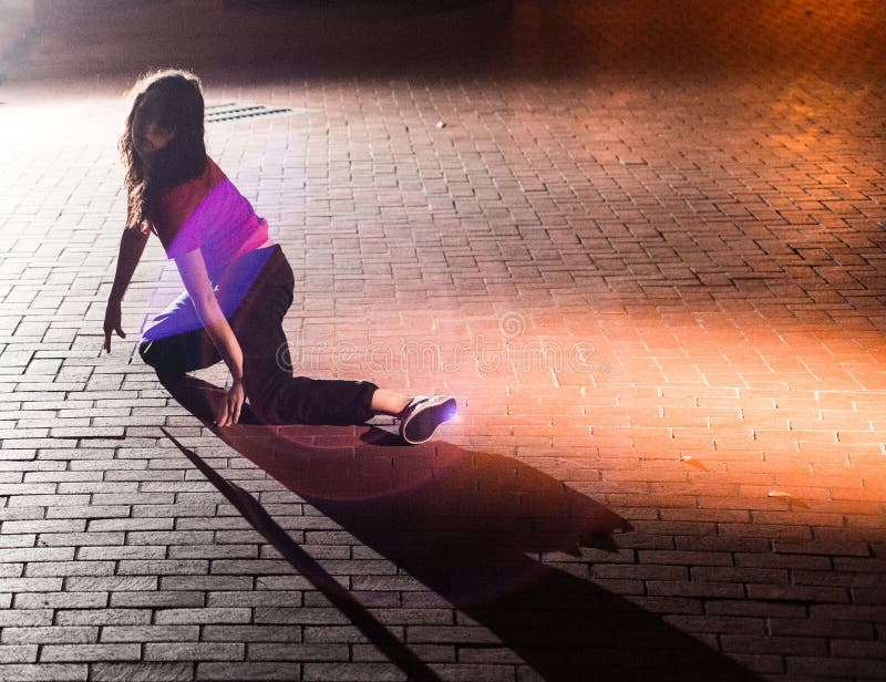 Girl breakdancing at night stock photo. Image of performer - 28059948