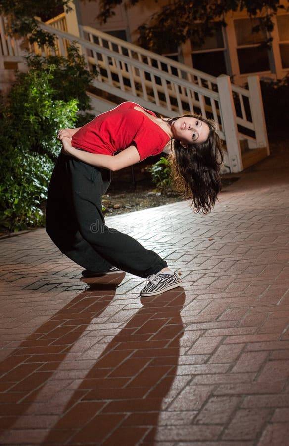 Girl breakdancing at night stock image. Image of music - 28059955