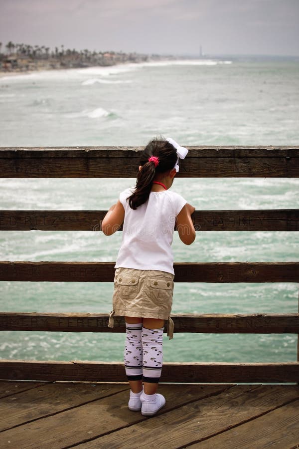 Girl on bridge stock photo. Image of skirt, waves, water - 15041430