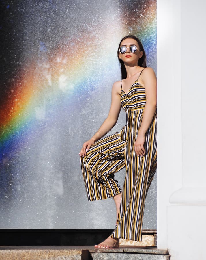 Girl Brunette Model Standing and Posing Near with Rainbow Vertical ...