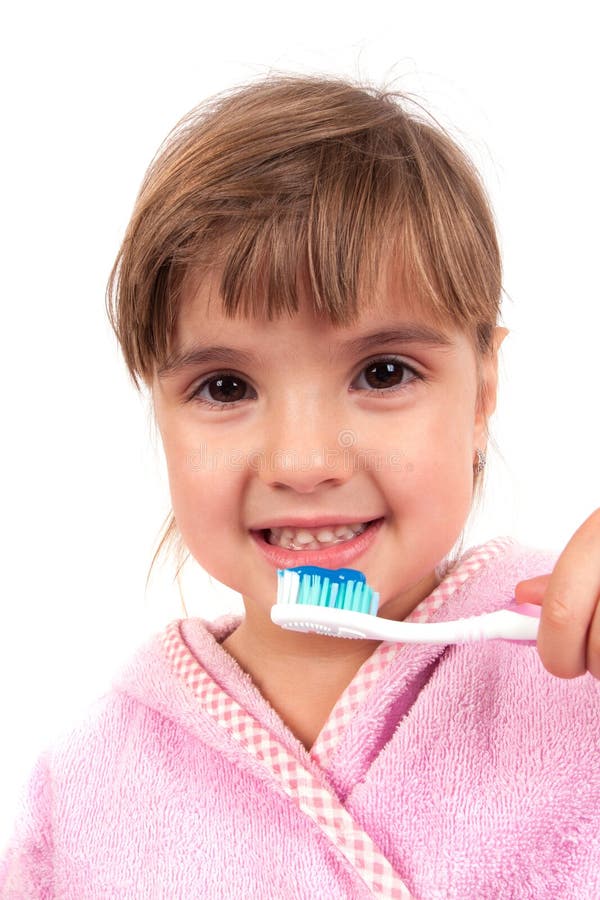 Girl brushing her teeth stock image. Image of health - 27819955