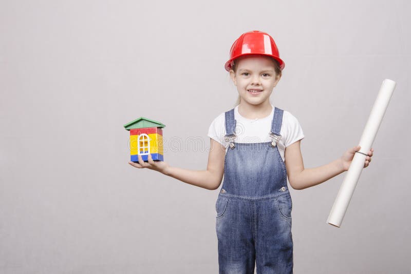 Girl Builder Keeps House and Drawing Stock Photo - Image of selection ...