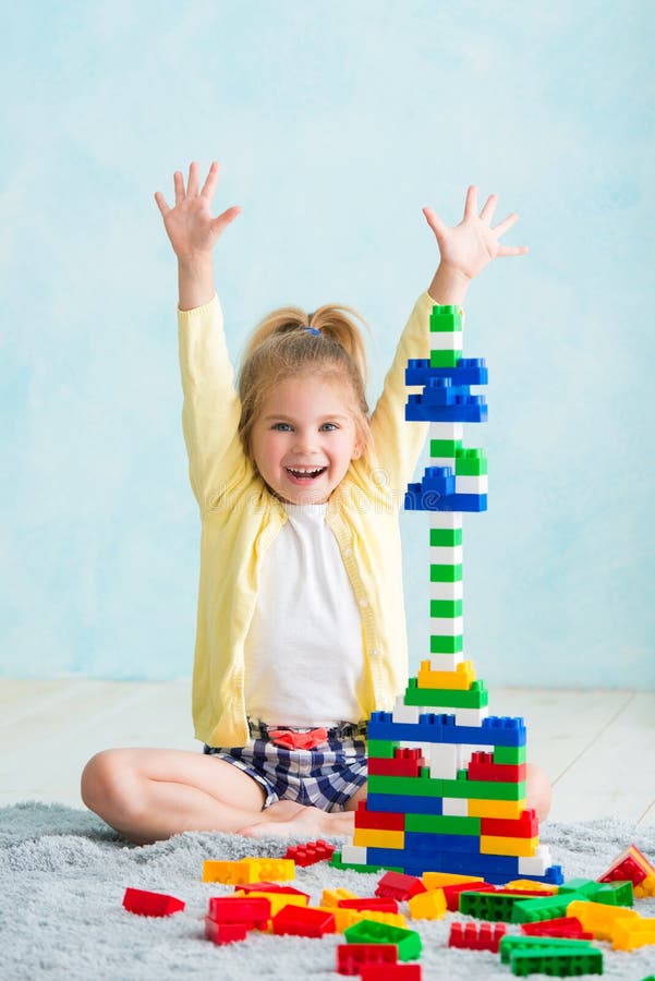 The Girl Built a Tower of Cubes. the Joy of Games Stock Image - Image ...