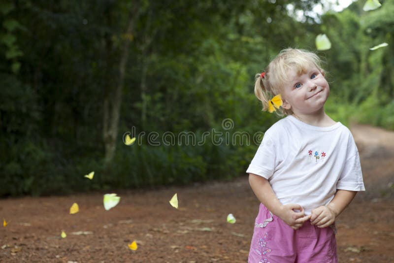 Girl and butterfly stock image. Image of blond, face - 12887129