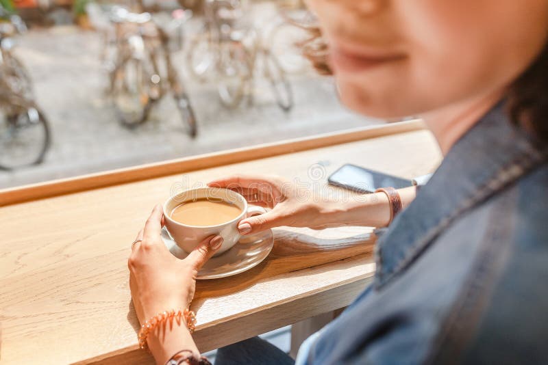 Girl in the Cafe Drinking Coffee Near the Window Stock Image - Image of ...