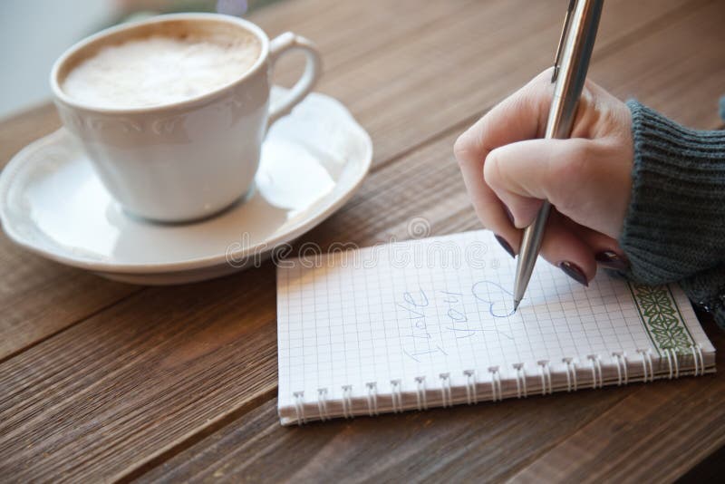 Girl Writing Into Notebook In Cafe Stock Photo - Image of cute, city ...