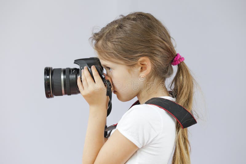 Girl with camera stock image. Image of seven, technology - 20142593