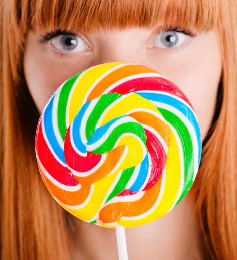 Girl with a candy stock photo. Image of bonbon, colorful - 10516024