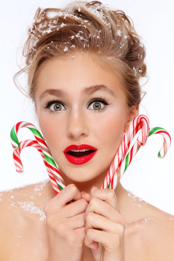 Girl with candy canes stock photo. Image of guilty, pleasure - 22334356