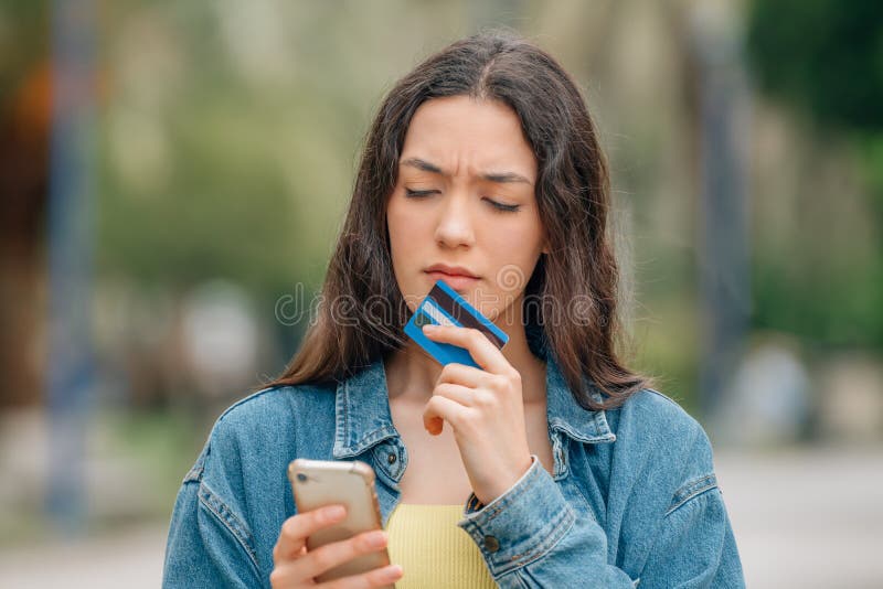 Girl with Card Online with Expression of Doubt Stock Image - Image of ...