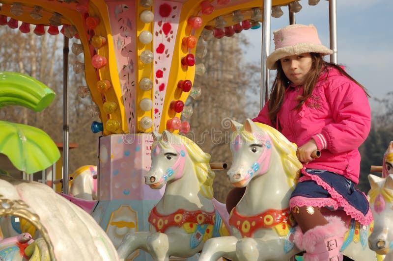 Girl on carousel stock photo. Image of ride, white, riding - 3813874