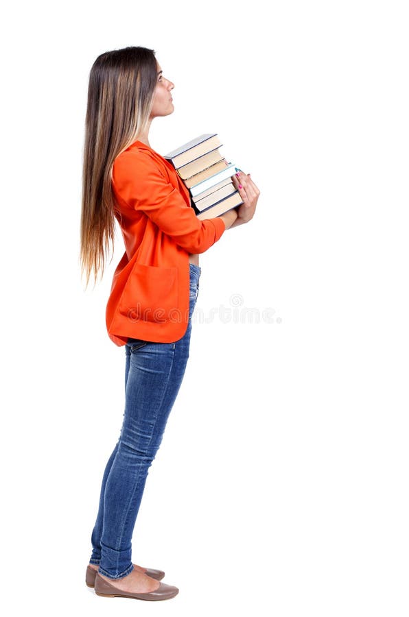Girl Carries a Heavy Pile of Books. Back View Stock Photo - Image of ...