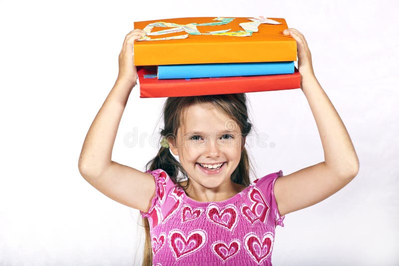 Girl is carrying books stock image. Image of focused - 20620793