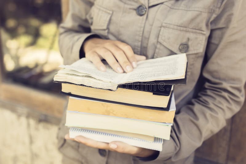 Girl Carrying Pack of Books Stock Photo - Image of literature, resting ...