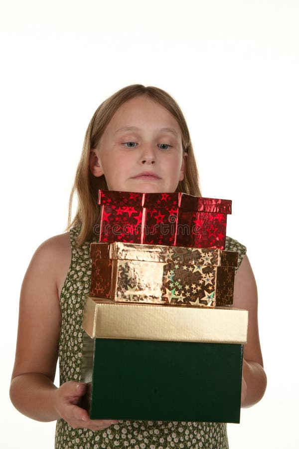 Girl carrying presents stock photo. Image of background - 12948460