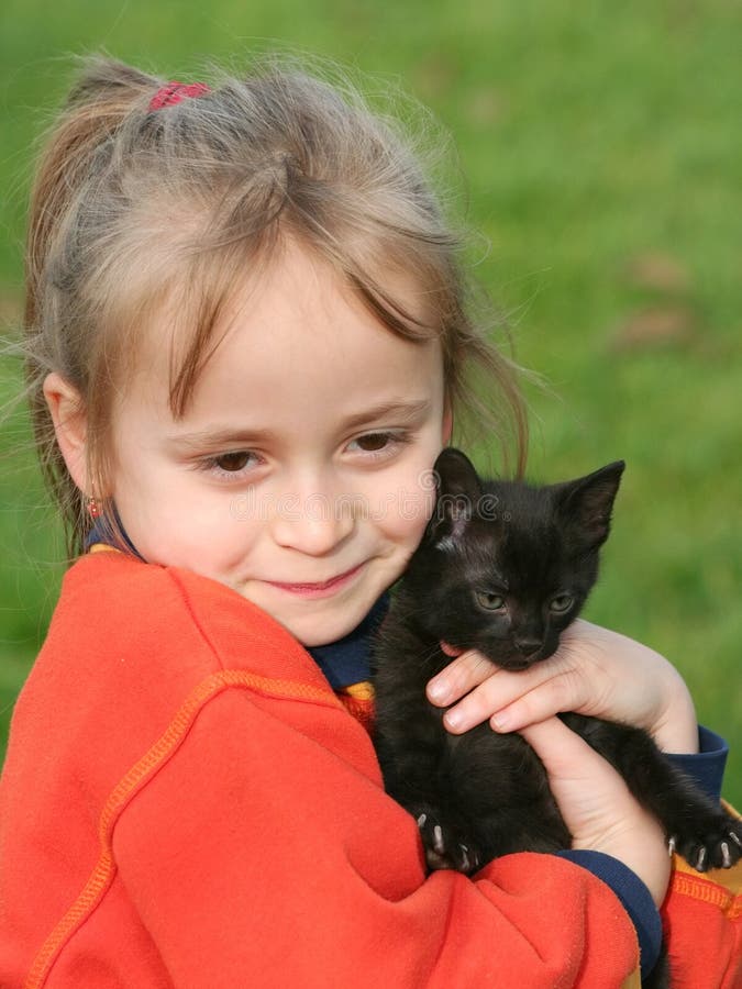 Girl with cat stock image. Image of youth, blonde, smile - 1436535