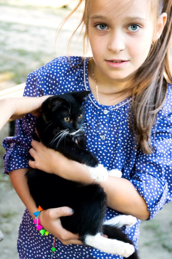 Girl with cat stock photo. Image of cheerful, emotions - 50299242
