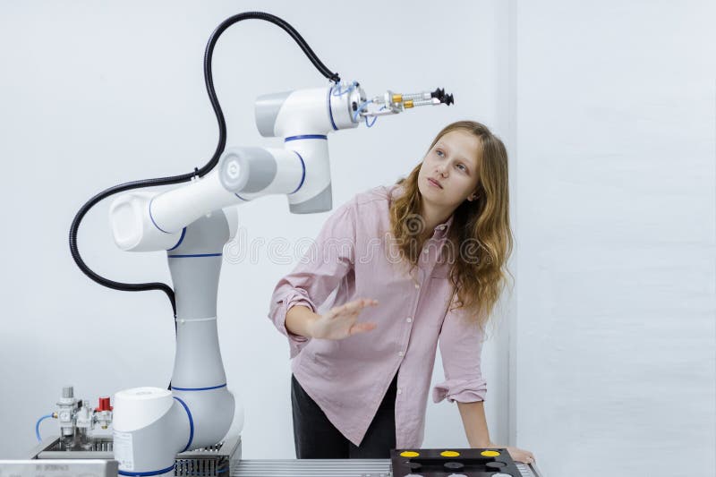 Girl Caucasoid Education Electronic Robotic Arm on Table at Class Room ...
