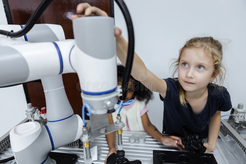 Girl Caucasoid Education Electronic Robotic Arm on Table at Class Room ...