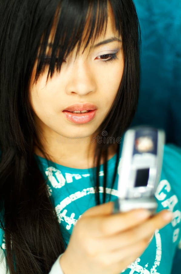 Blonde girl with cell pho stock photo. Image of attractive - 511642