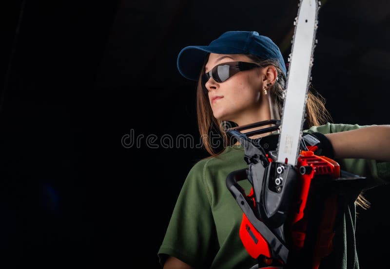 Girl with a Chain Saw on Dark Background Stock Image - Image of beauty ...