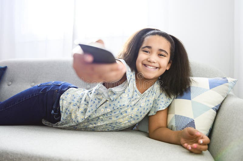 Girl Changing Channel Remote Control Front Television Home Stock Photos ...