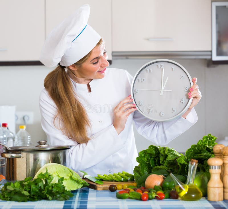 Girl in Chef Uniform with Clock and Veggies at Kitchen Stock Image ...